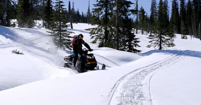 Snowmobiling in National Parks: Top Trails & Trips in 2023